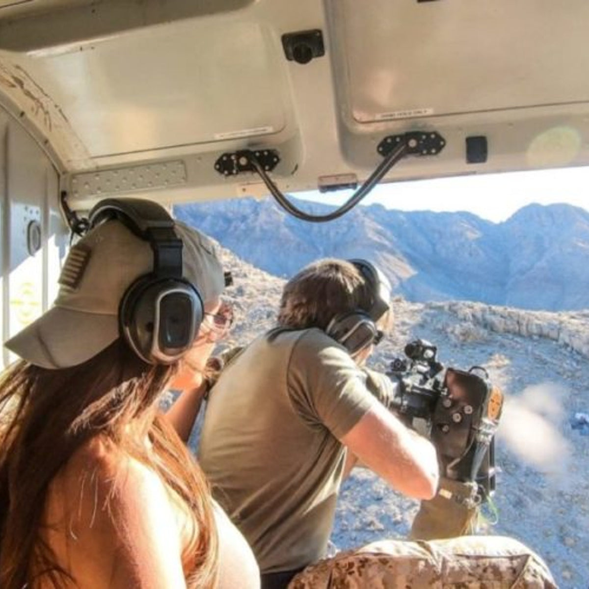 Yes, you can shoot a machine gun from a helicopter