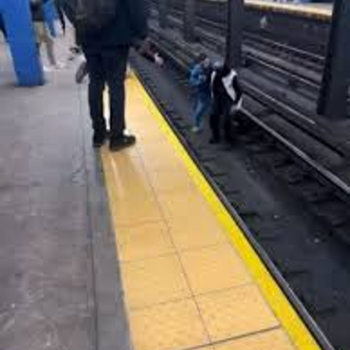 Marine Saves Man From Subway Tracks